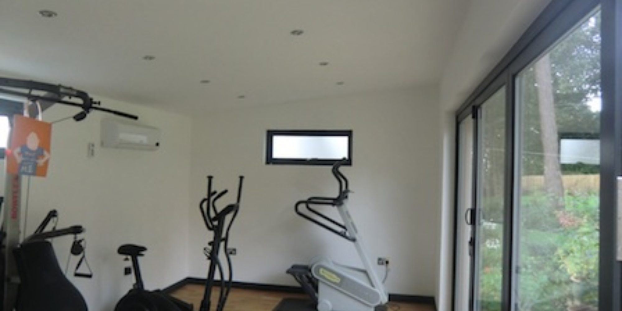 Luxury Home Gym With Folding Doors | Vertis Buildings
